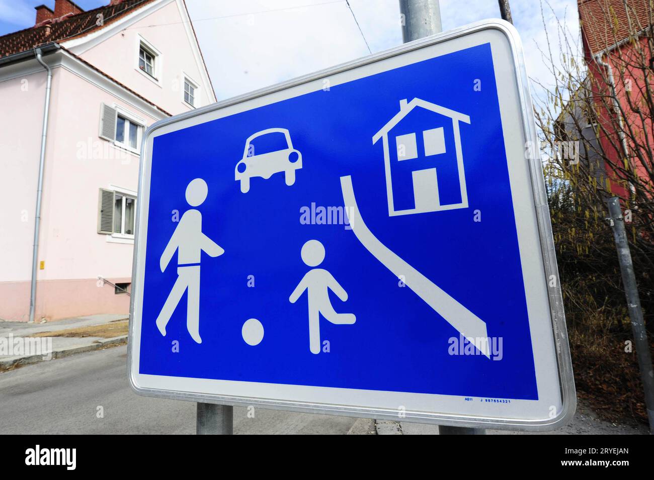Residential street sign, drive slow Stock Photo - Alamy