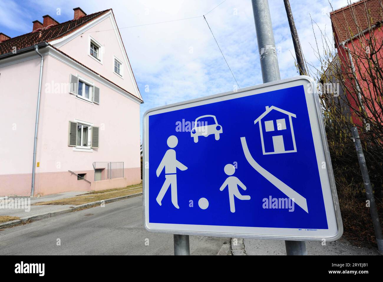 Residential street sign, drive slow Stock Photo - Alamy