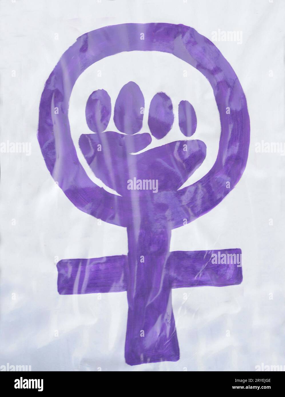 Raised fist within Venus symbol Stock Photo - Alamy