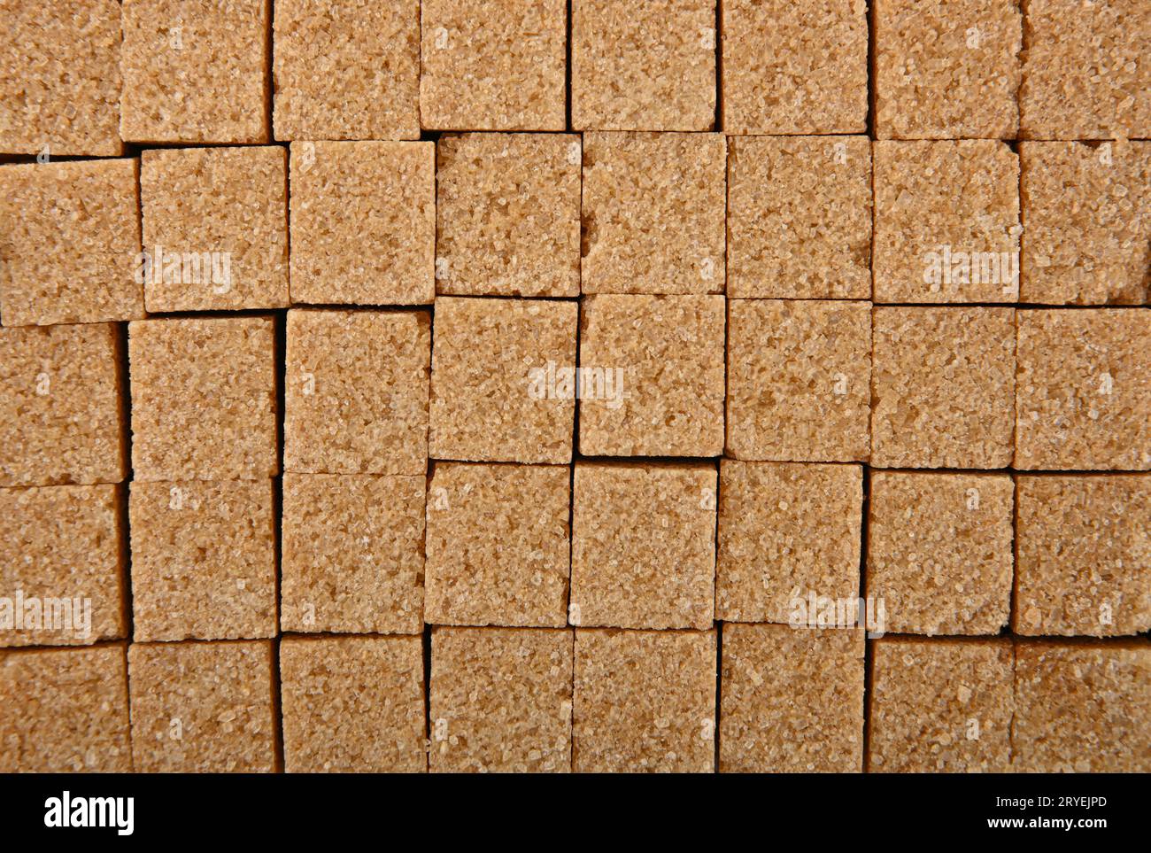 Background texture pattern of brown sugar cubes Stock Photo - Alamy