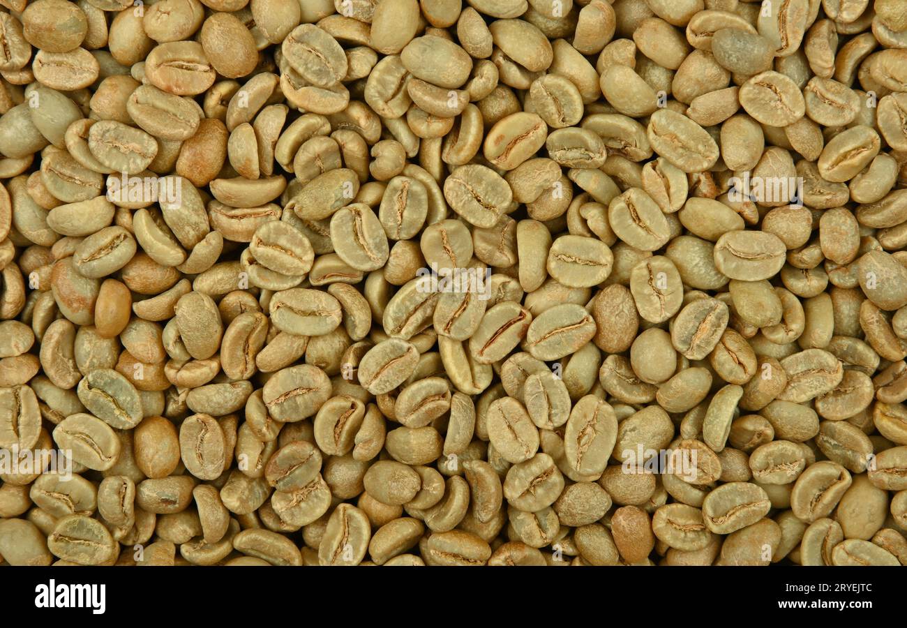 Background of unroasted raw green coffee beans Stock Photo - Alamy
