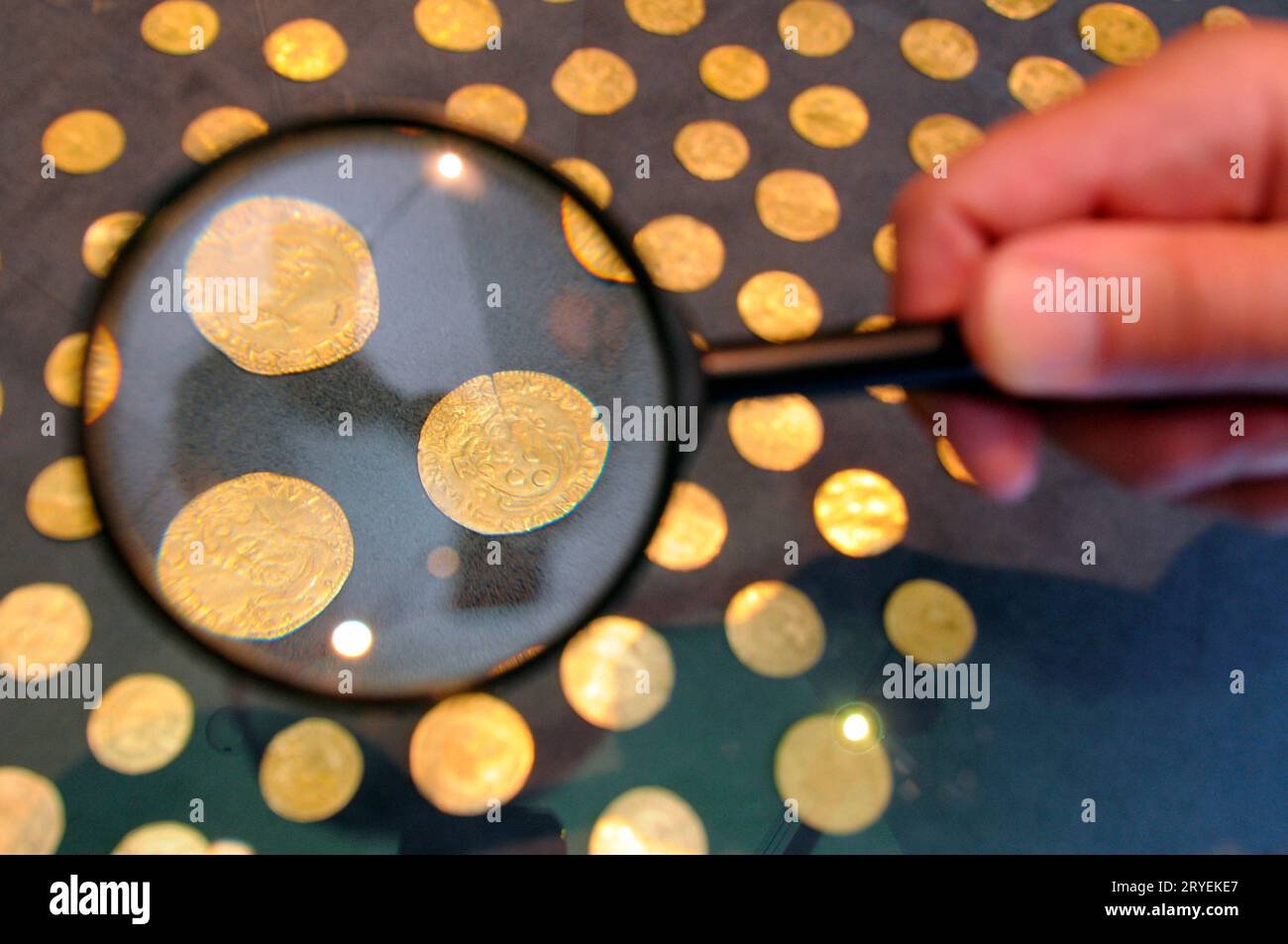 A collection of gold coins Stock Photo - Alamy