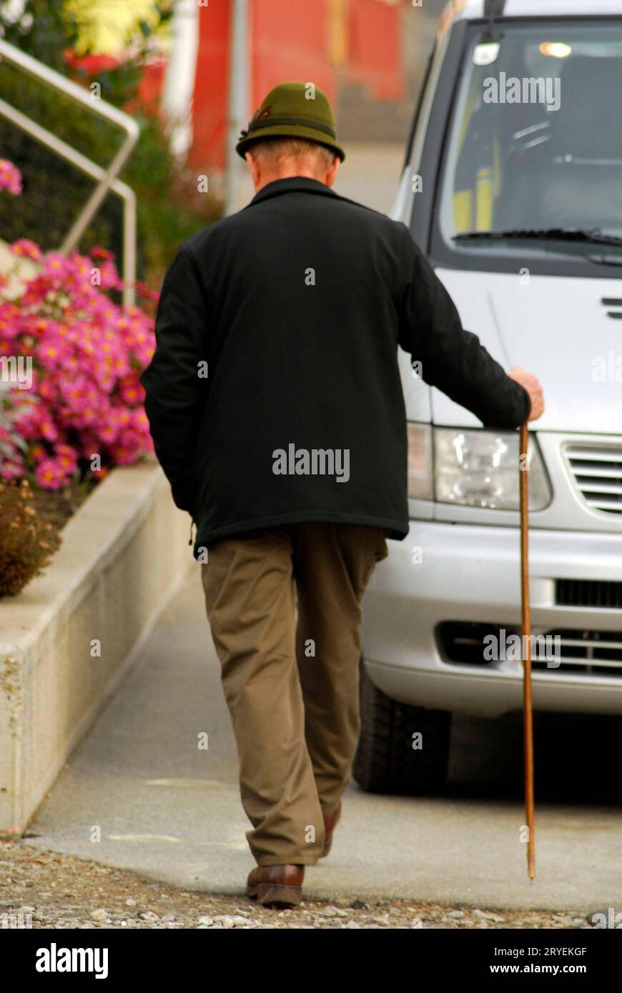 Old man with walking stick Stock Photo - Alamy