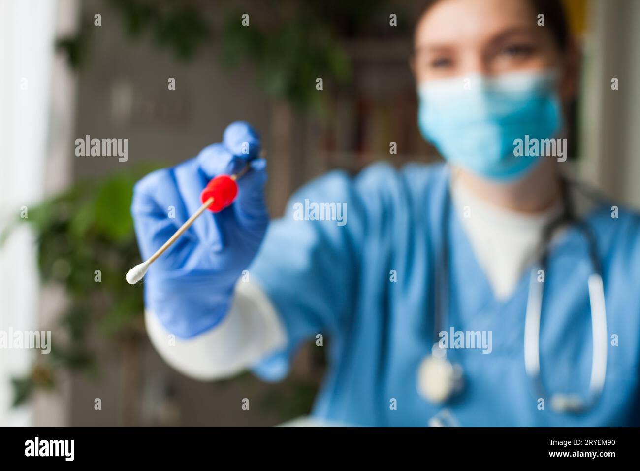 Doctor performing COVID-19 swab test Stock Photo - Alamy