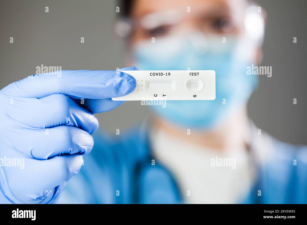Doctor holding positive test hi-res stock photography and images - Alamy
