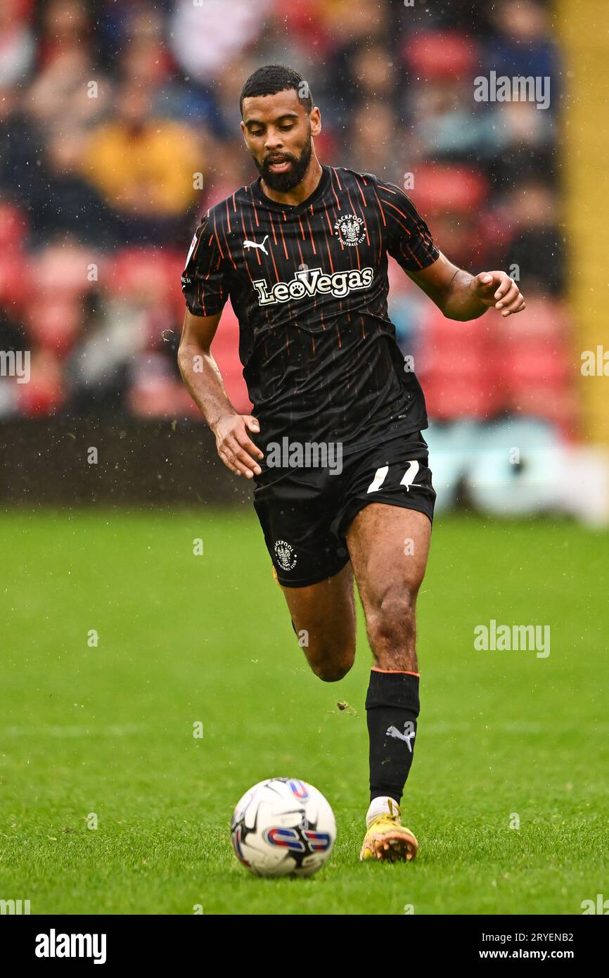 CJ Hamilton #22 of Blackpool makes a break with the ball during the Sky ...