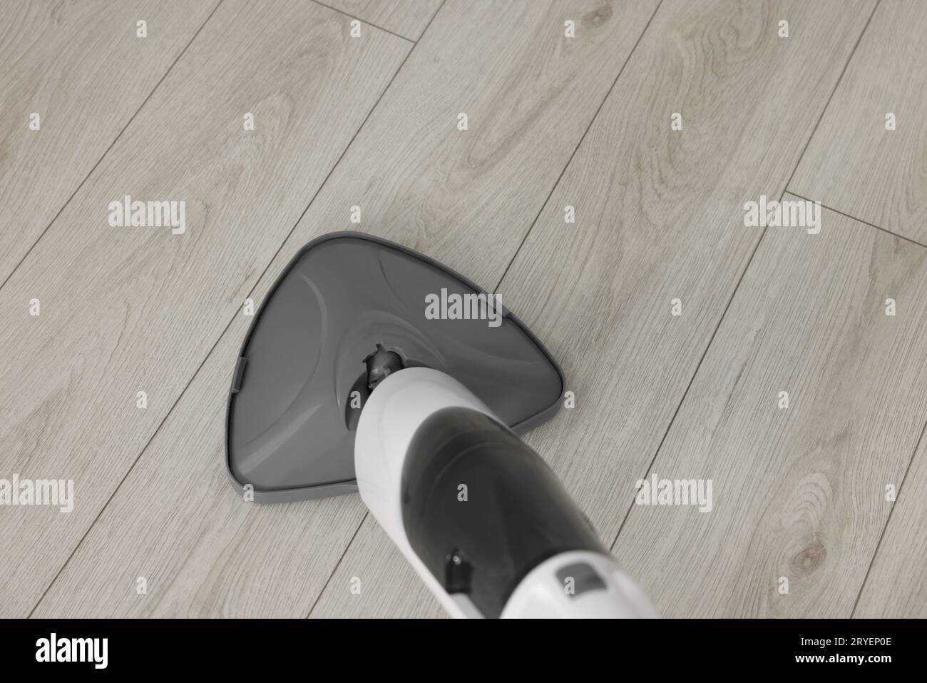 Cleaning floor with steam mop at home, above view Stock Photo - Alamy
