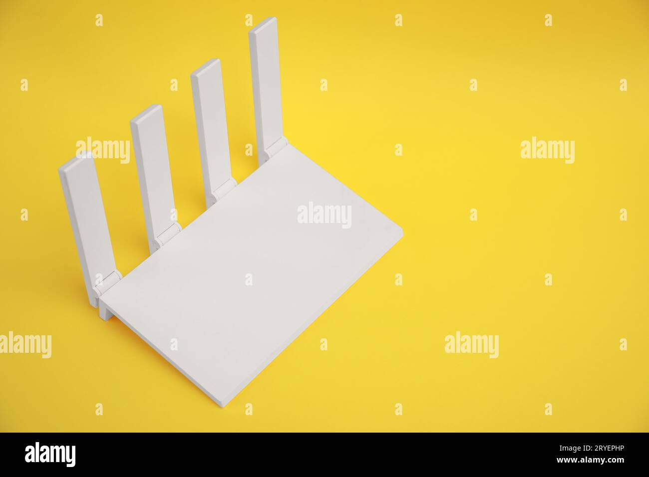 Modern Wi-Fi router on yellow background. Space for text Stock Photo ...