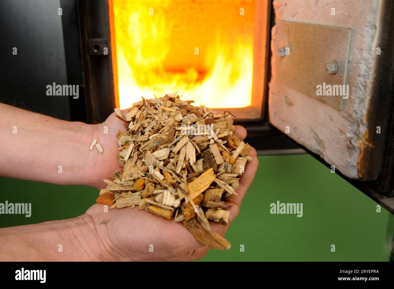 Heating with wood chips at home Stock Photo - Alamy