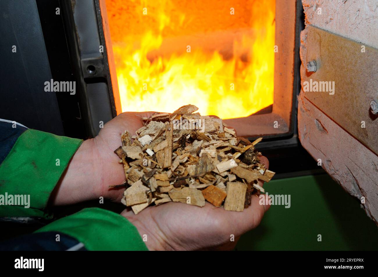 Heating with wood chips at home Stock Photo - Alamy
