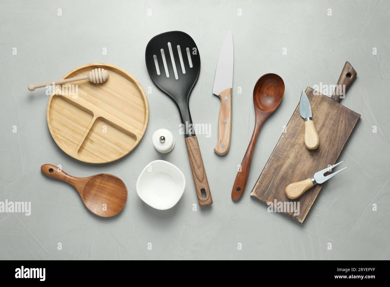 Set of different kitchen utensils on grey table, flat lay Stock Photo ...