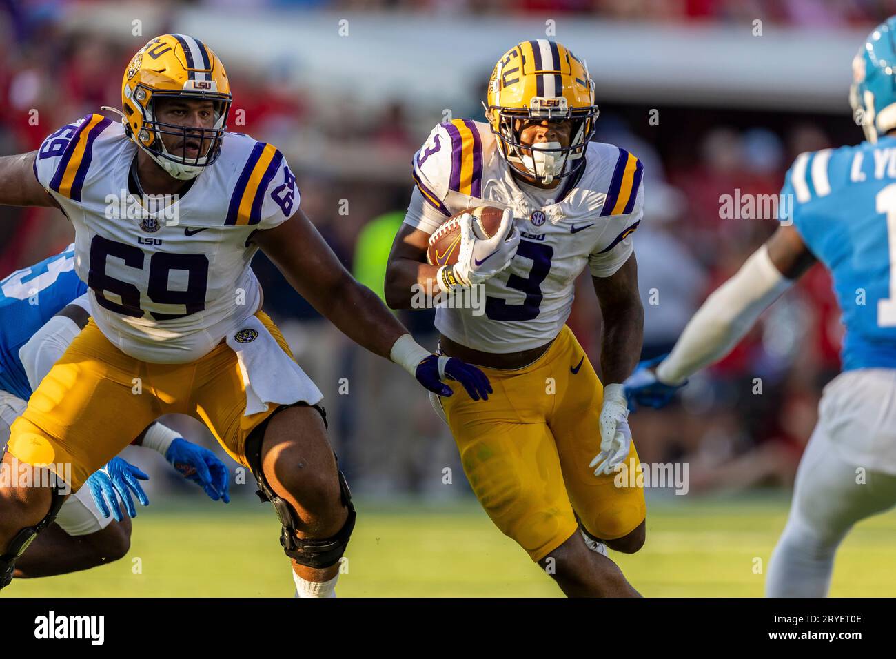 LSU running back Logan Diggs (3) runs the ball behind the protection of ...