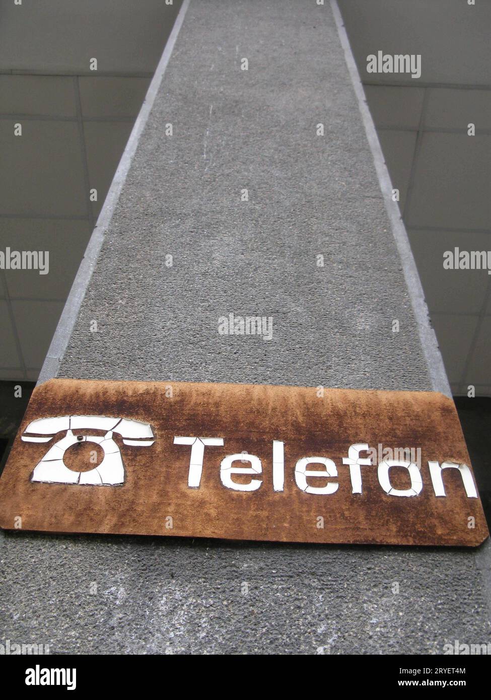Landline telephone symbol, white, brown background Stock Photo - Alamy