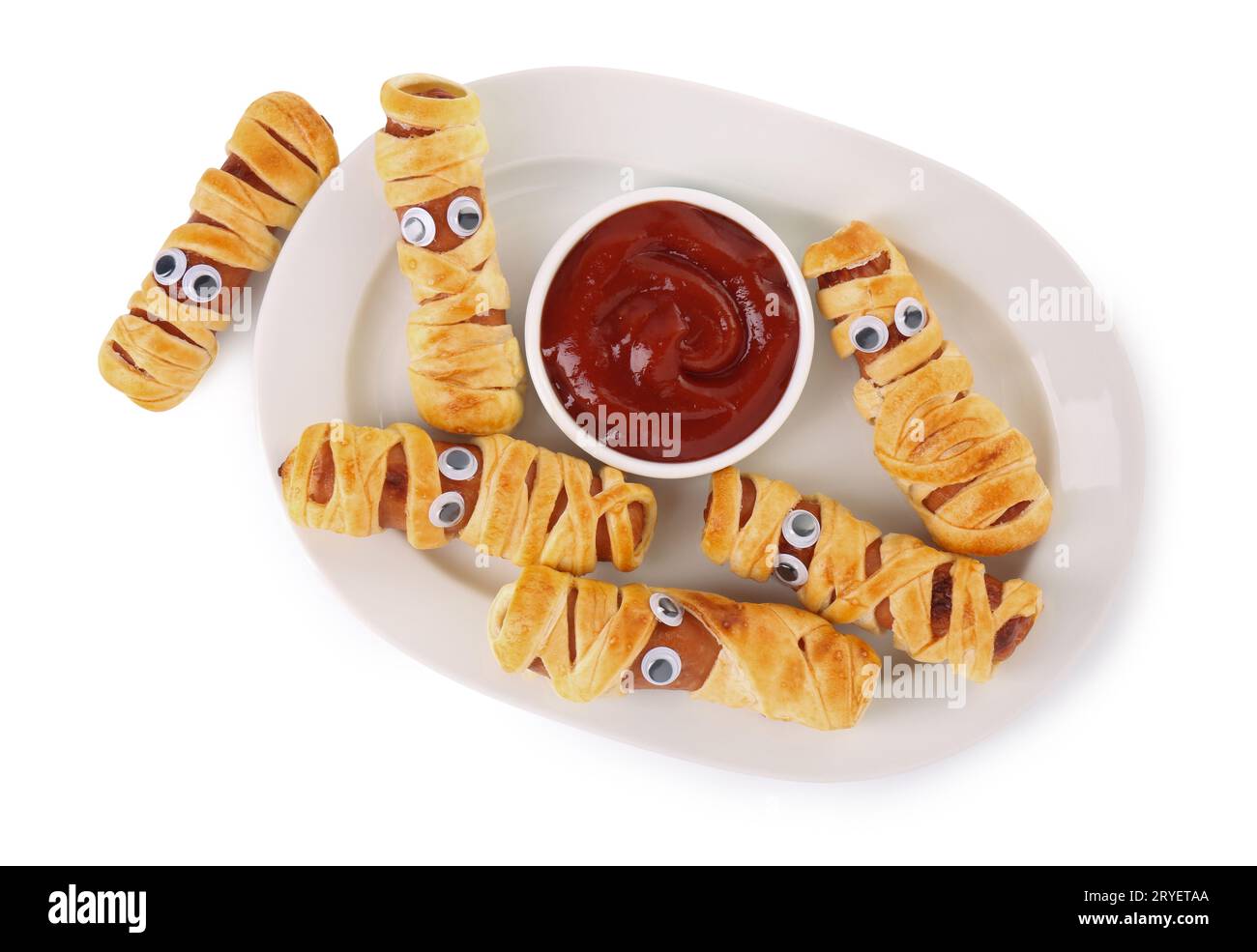 Plate with tasty sausage mummies for Halloween party and ketchup ...
