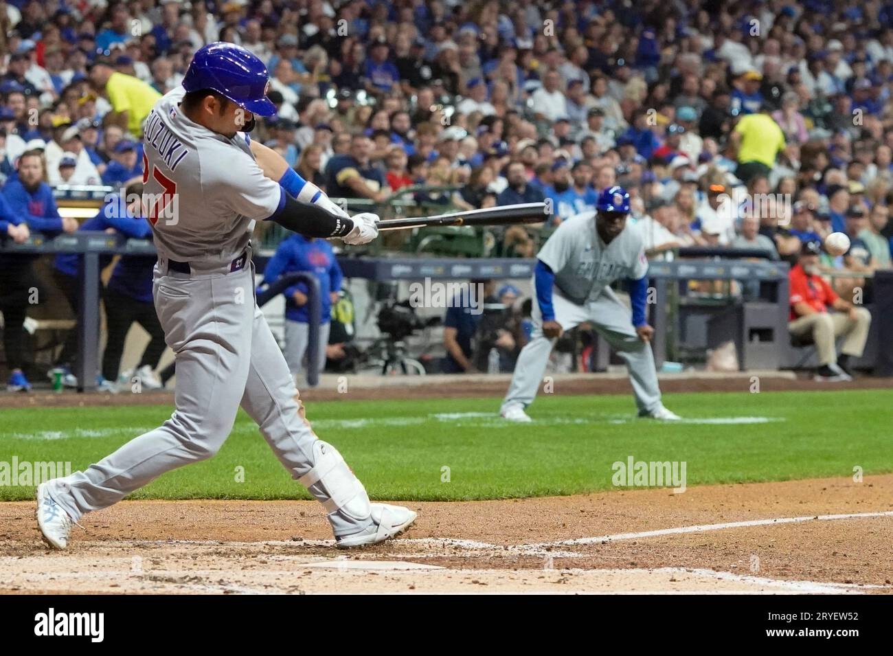 Chicago Cubs' Seiya Suzuki hits a single during the fourth inning of a baseball game against the ...