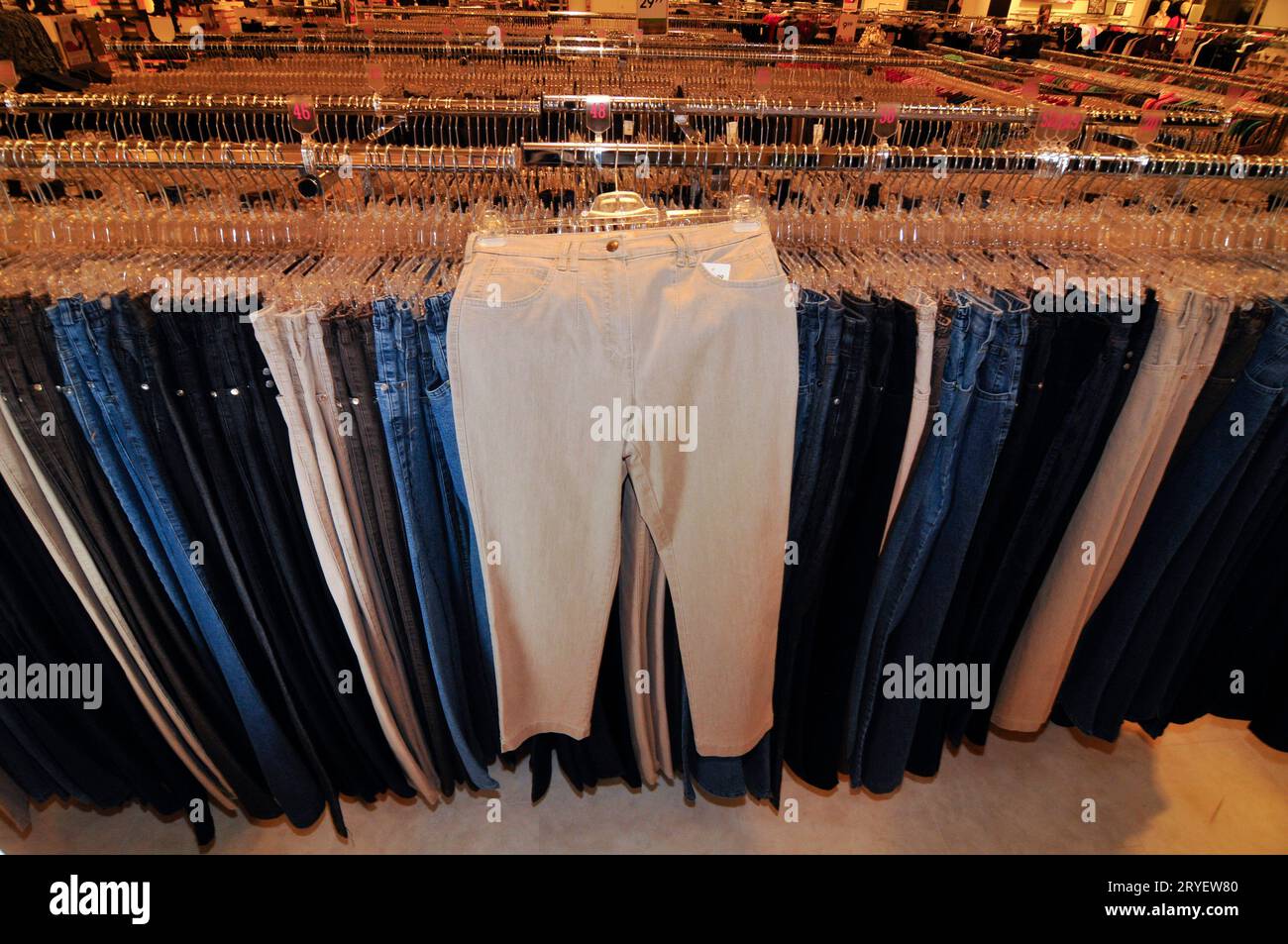 Pants in a clothing store Stock Photo - Alamy