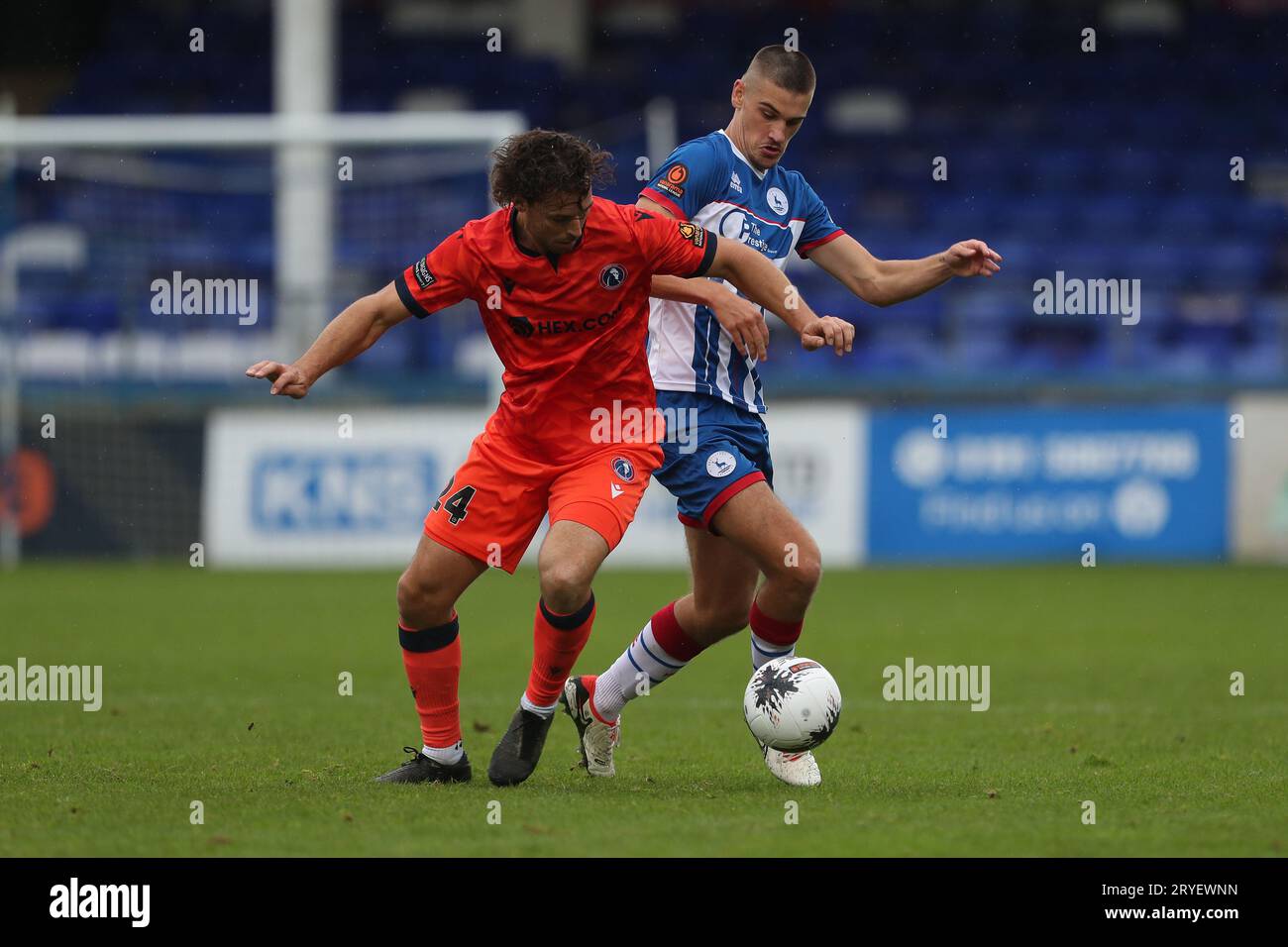 Dorking Wanderers' Harry Ottaway battles with Hartlepool United's Zak ...