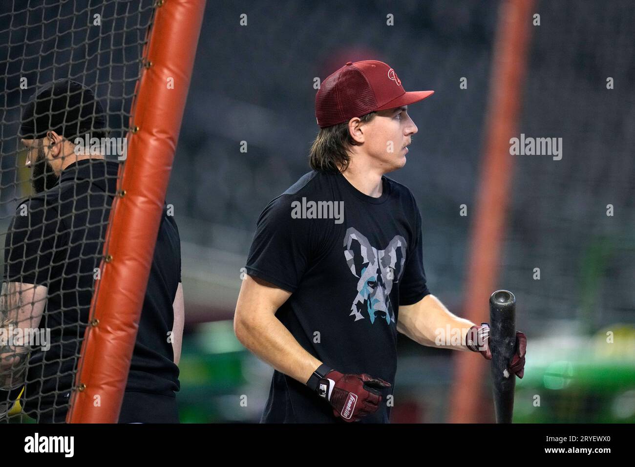 Arizona Diamondbacks' Jake McCarthy, right, walks past Diamondbacks ...