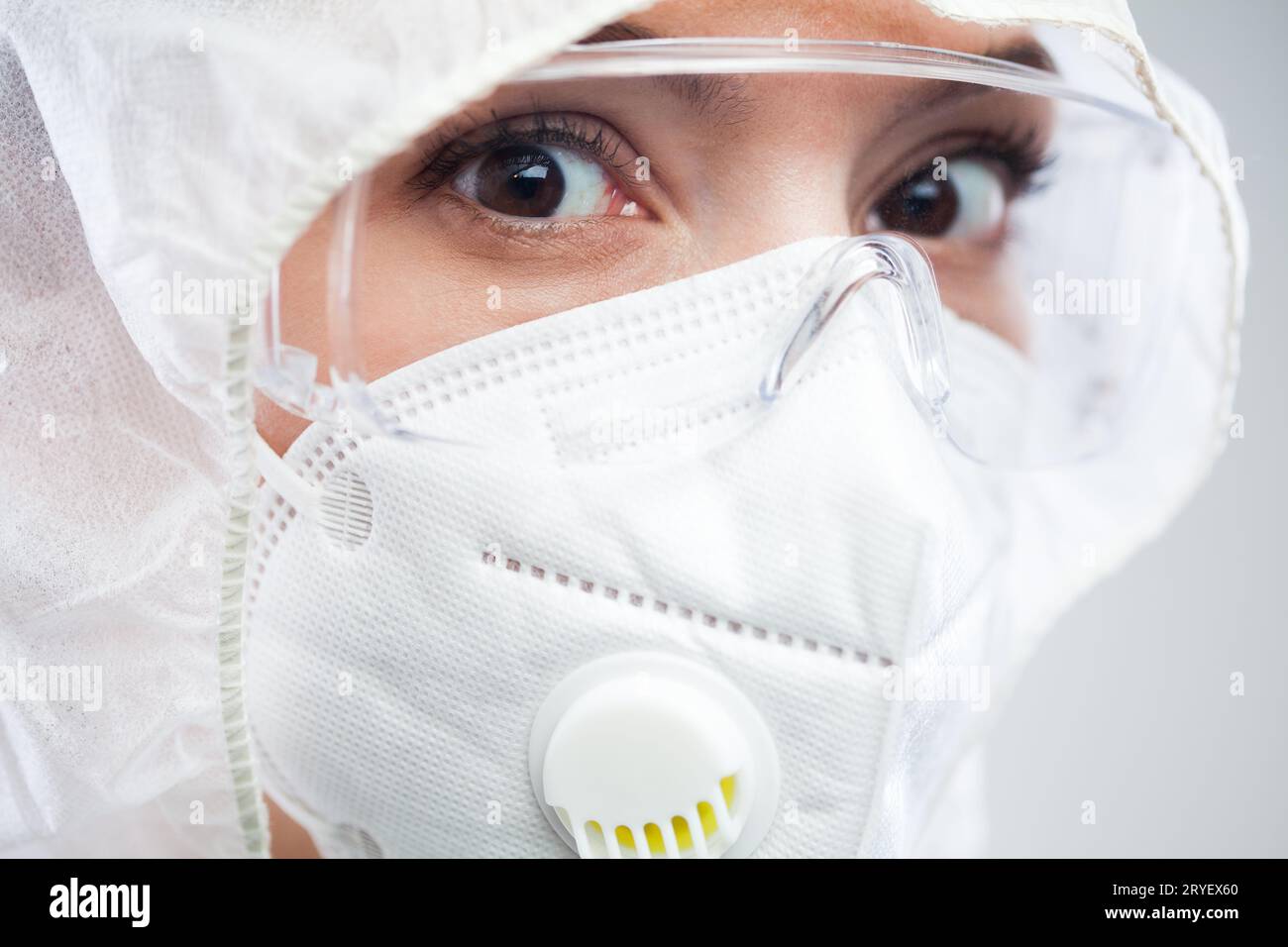 Closeup headshot of terrified UK NHS female nurse or doctor wearing ...