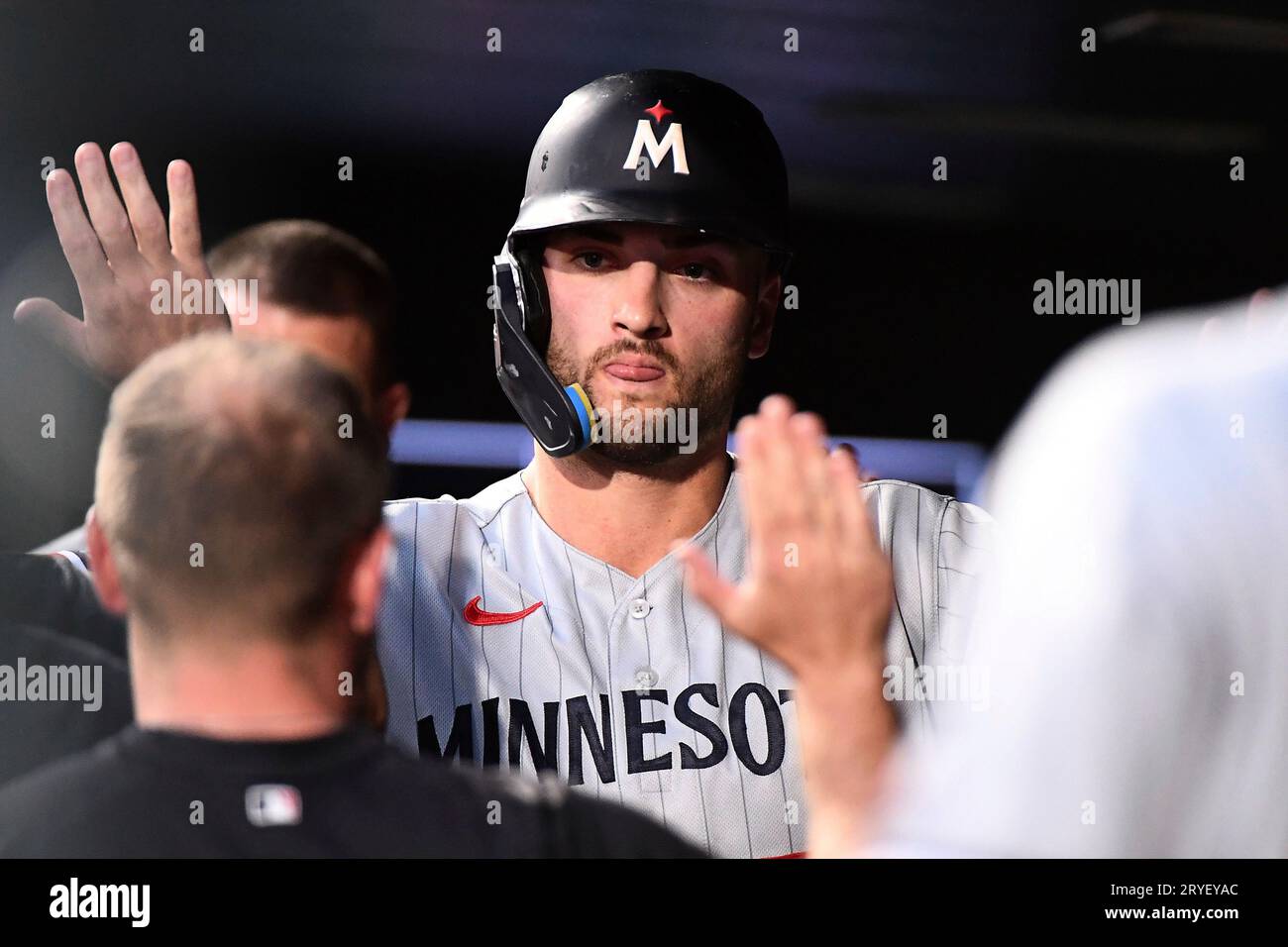 Minnesota Twins' Matt Wallner is congratulated after scoring against ...