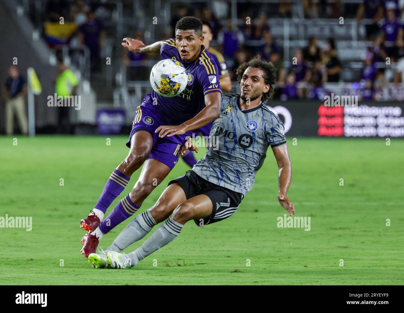 Orlando City midfielder Wilder Cartagena, left, and CF Montreal ...
