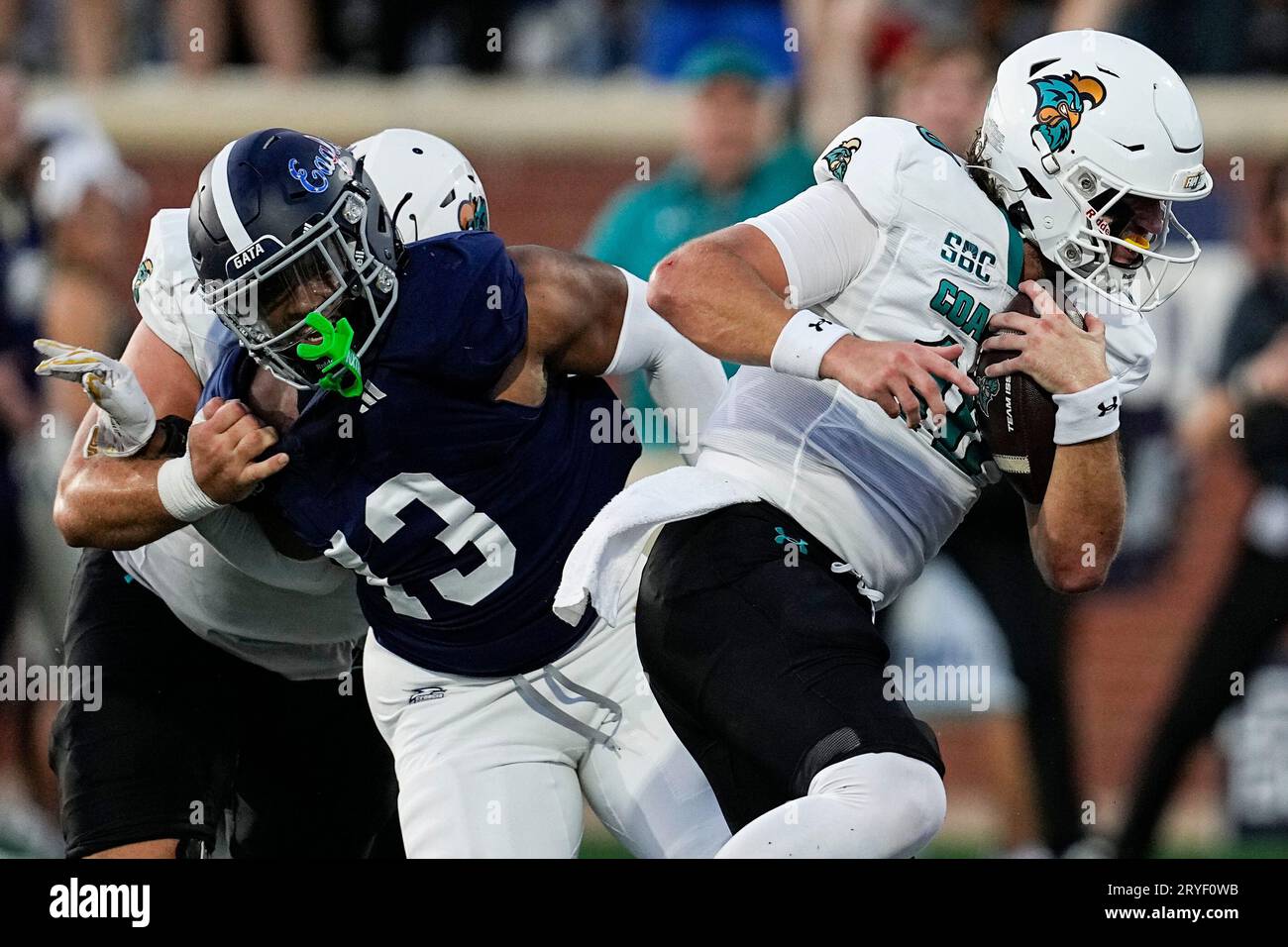 Coastal Carolina quarterback Grayson McCall (10) runs into the end zone ...