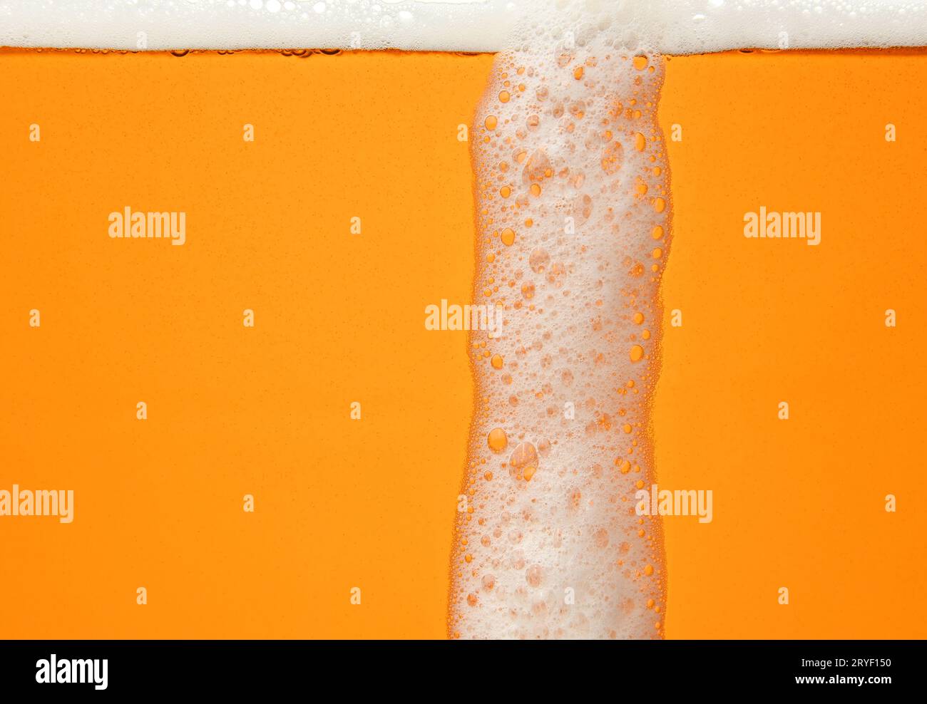 Close up background of beer with bubbles in glass Stock Photo - Alamy