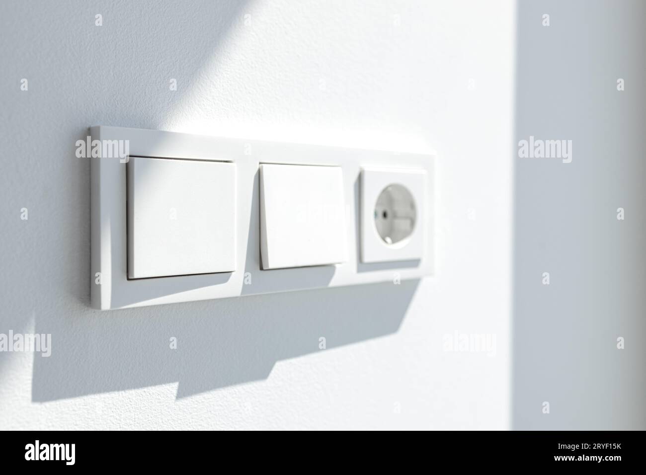 Modern White switch board with two switch and one european plug Stock ...