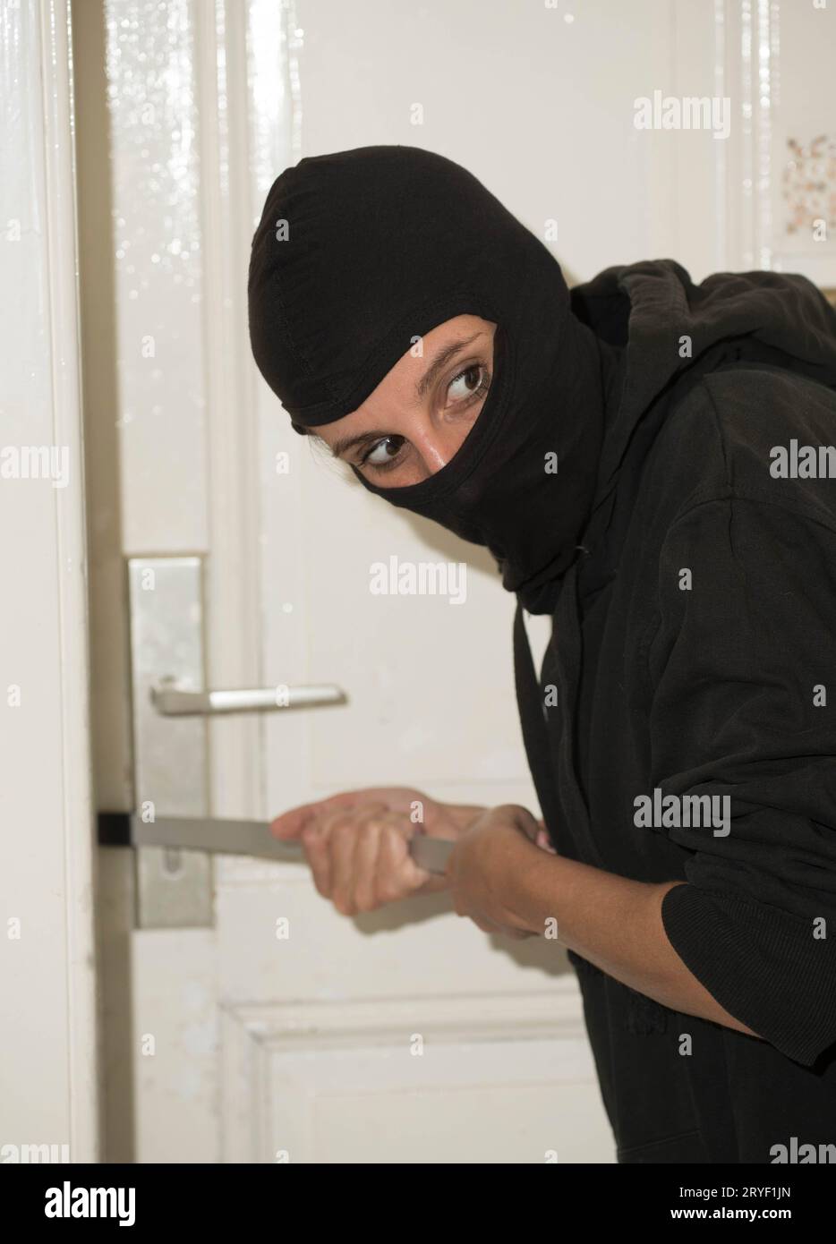 Breaking and entering into an apartment Stock Photo - Alamy