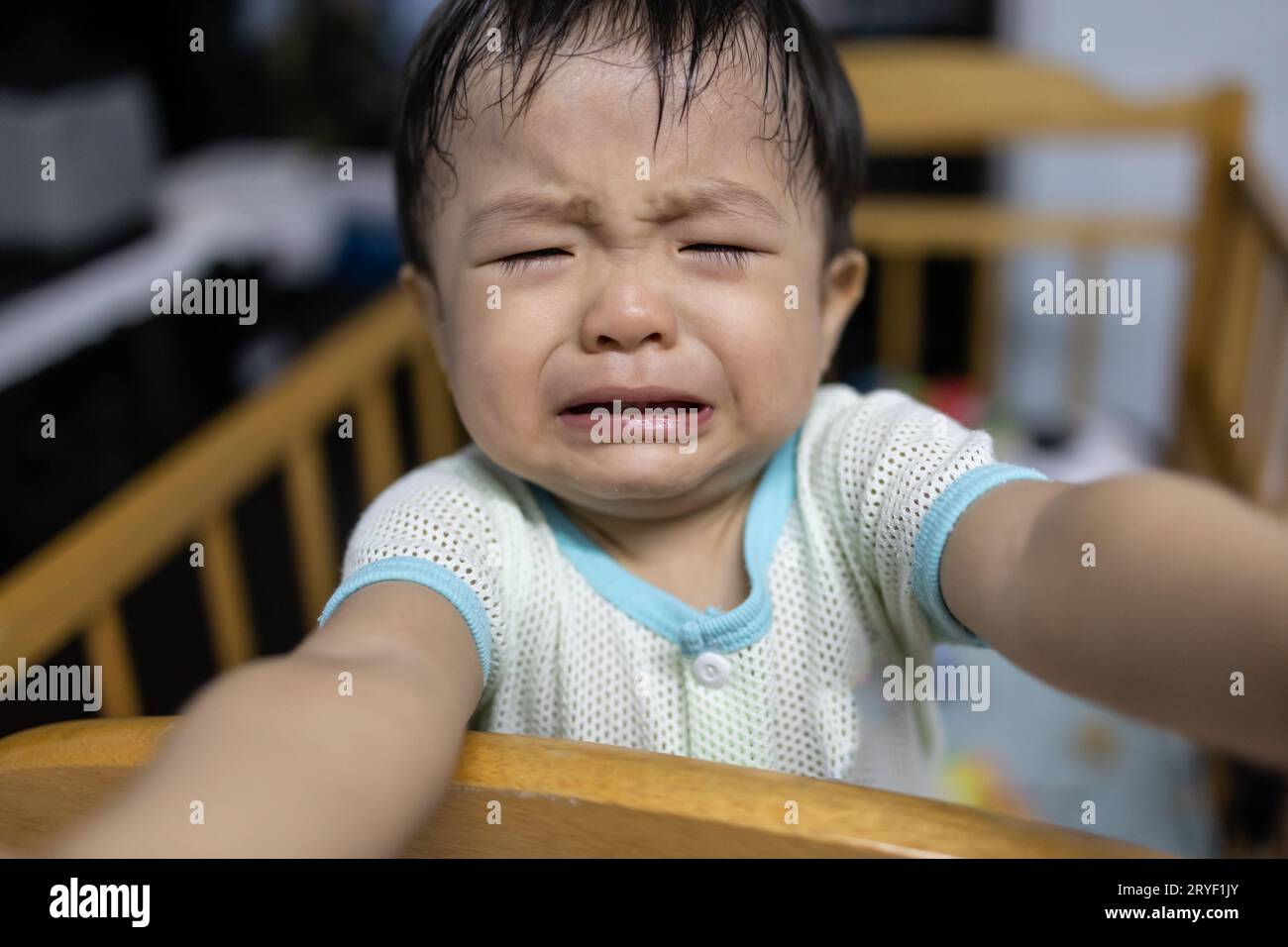 Portrait image of 1-2 years old childhood child with face of sad and ...