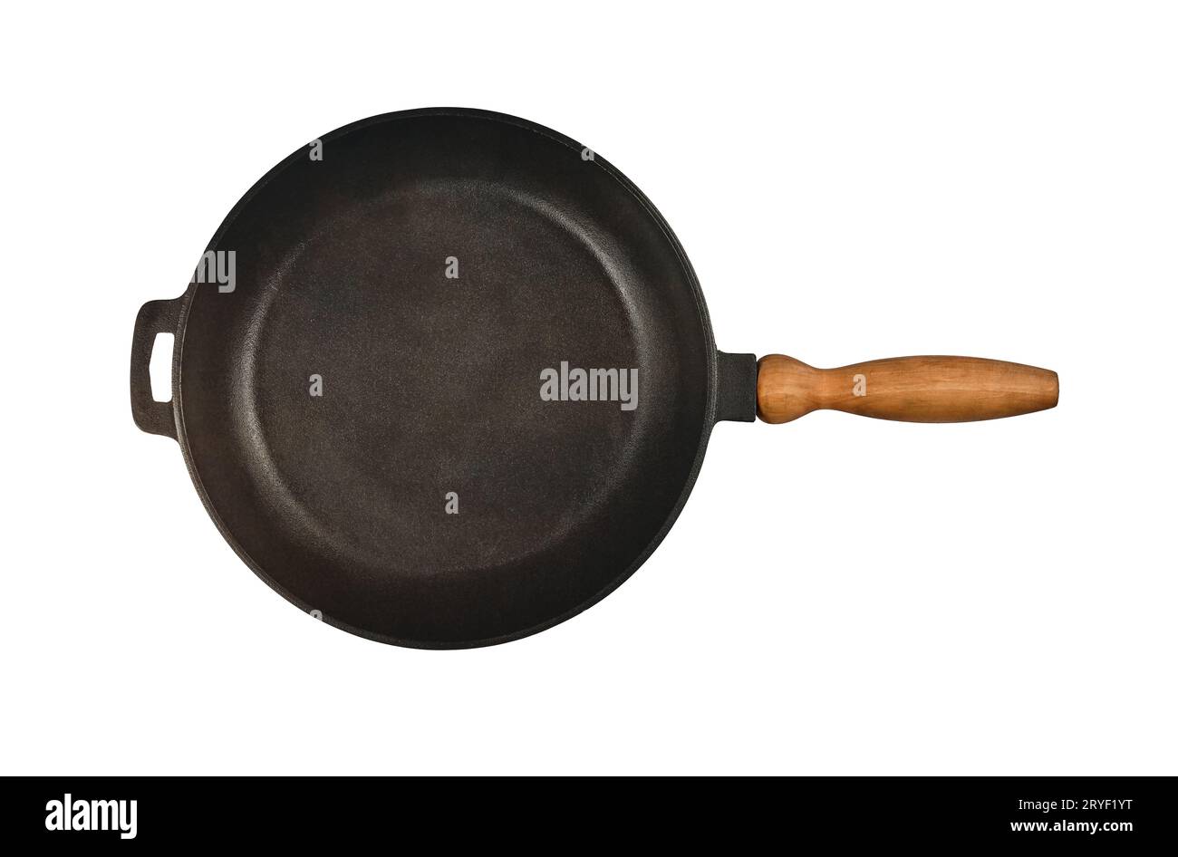 Cast iron frying pan with wooden handle isolated Stock Photo - Alamy