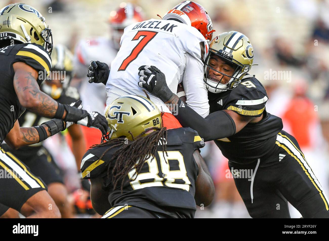 Georgia Tech defensive linemen Zeek Biggers (88) and Kyle Kennard (9 ...