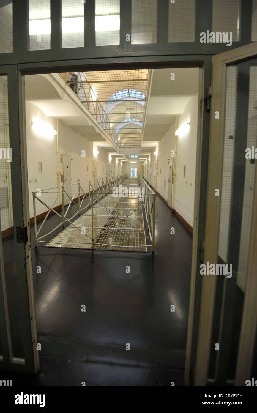The empty corridor of a prison Stock Photo - Alamy