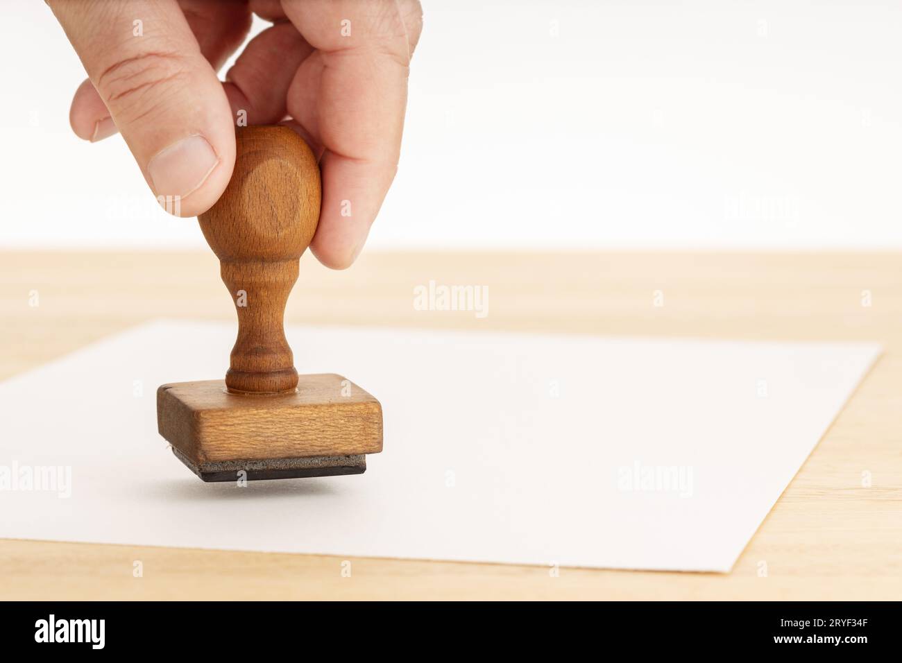 Holding rubber stamp hi-res stock photography and images - Alamy