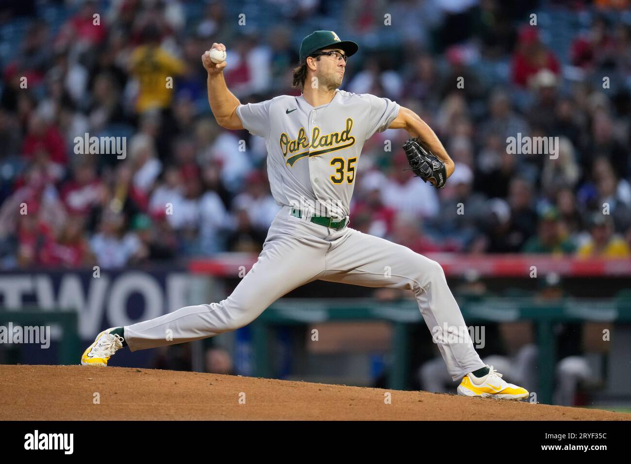 Oakland Athletics starting pitcher Joe Boyle (35) throws during the ...
