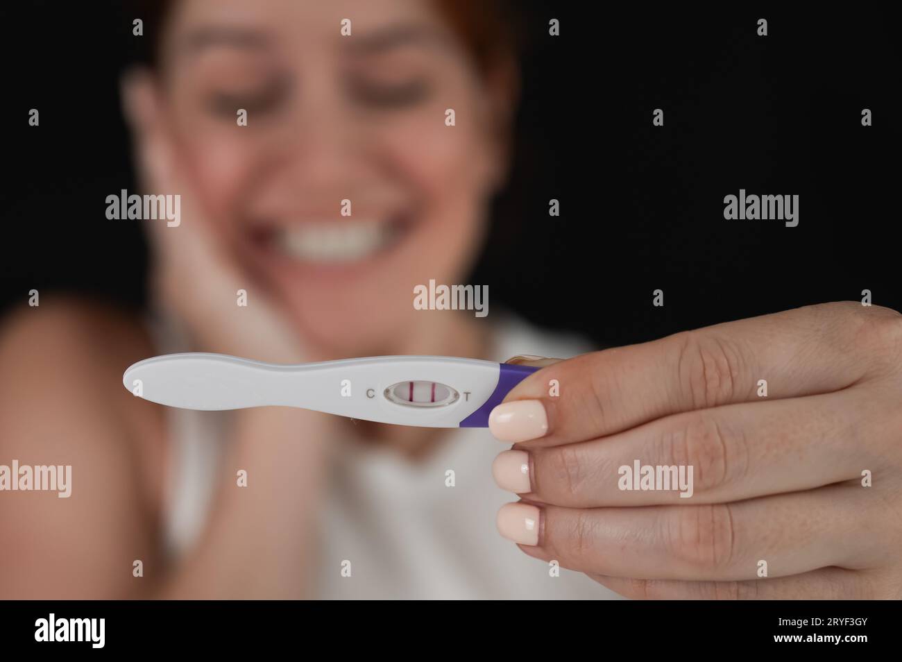 Blurred portrait of happy caucasian woman holding positive express ...