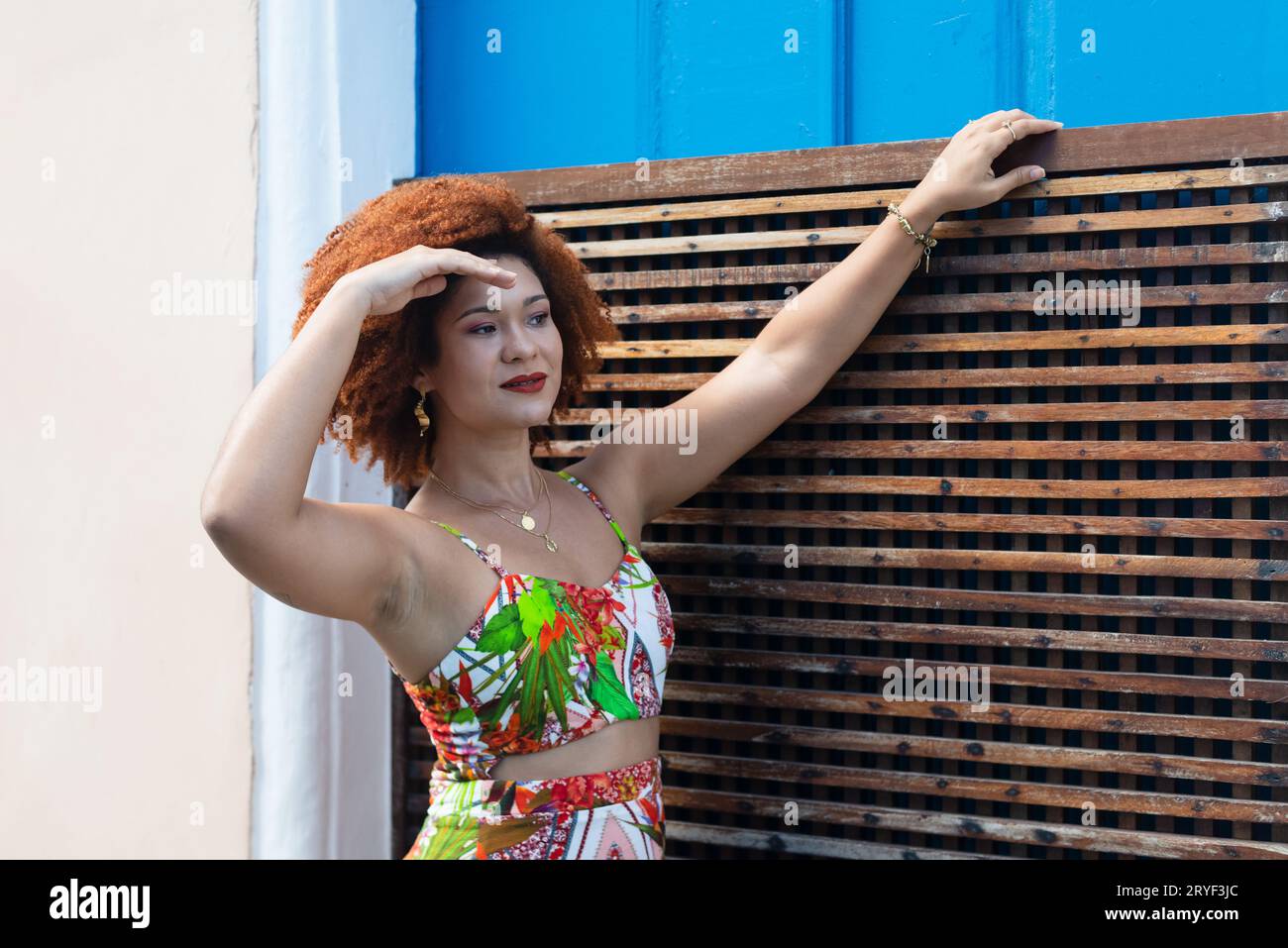 Girl holding railing hi-res stock photography and images - Alamy
