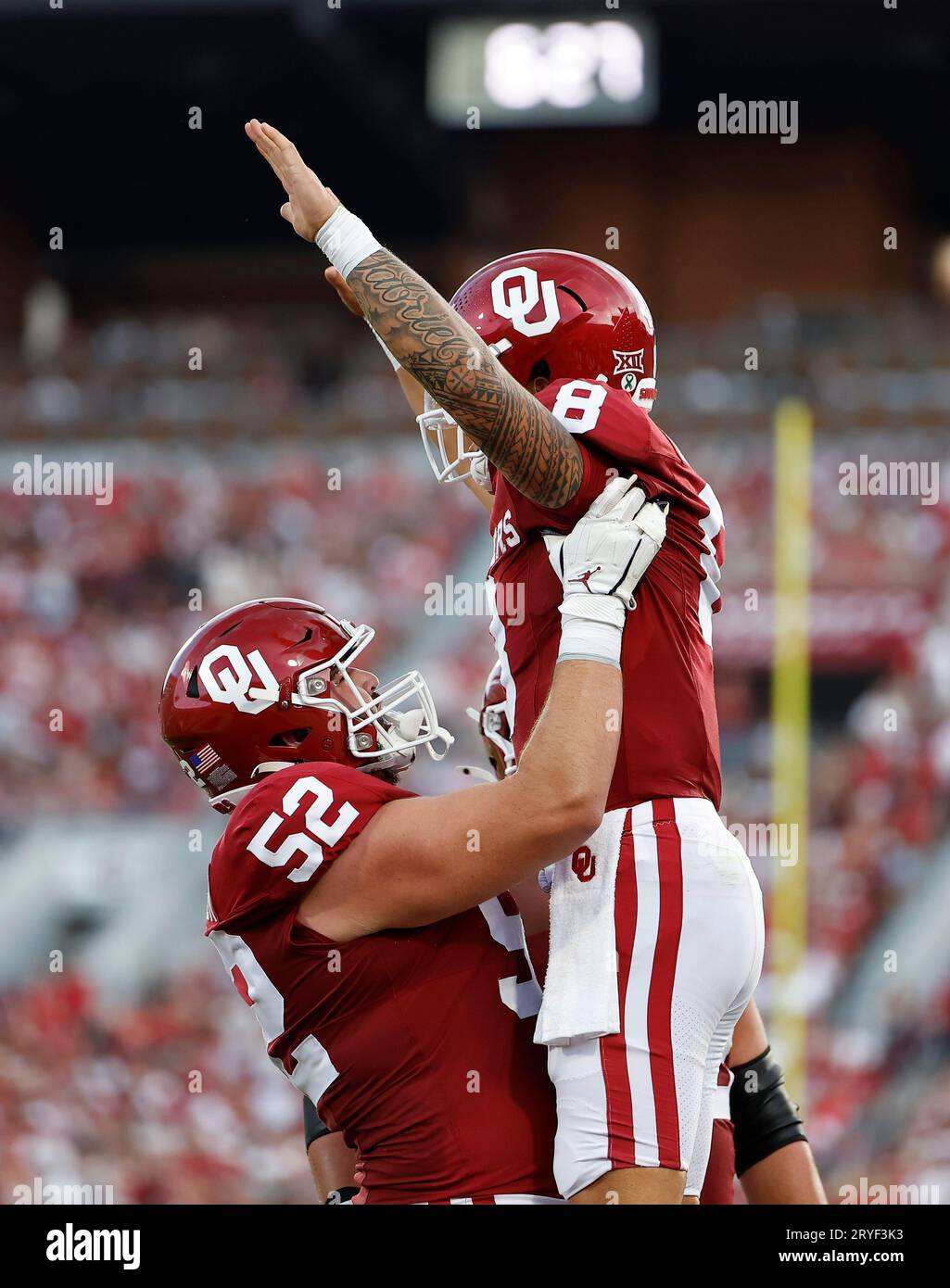 Oklahoma quarterback Dillon Gabriel (8) and offensive lineman Troy ...
