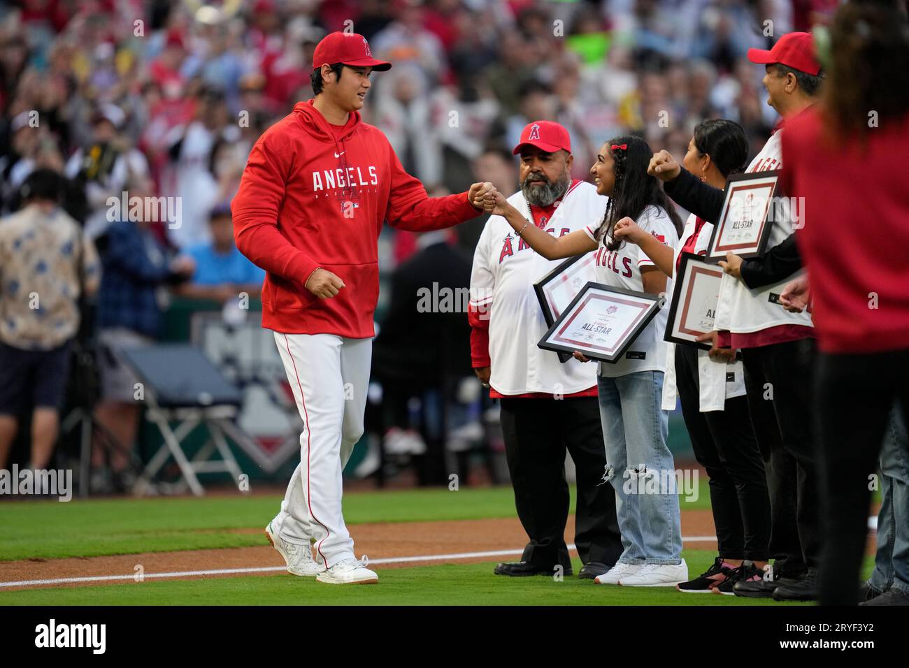 Los Angeles Angels' Shohei Ohtani greets Angel Stadium employees before ...