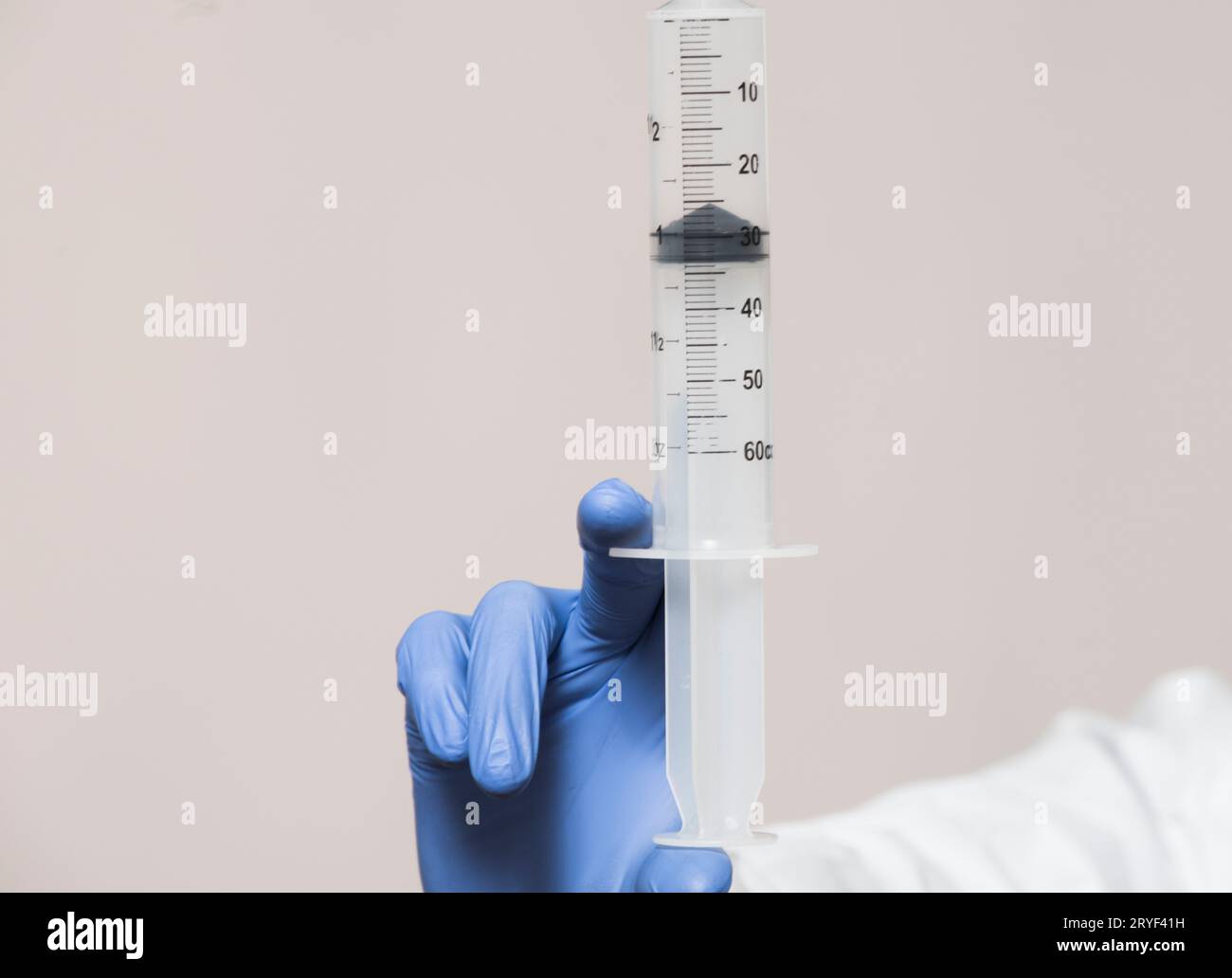 Vaccination by injection with a syringe Stock Photo - Alamy
