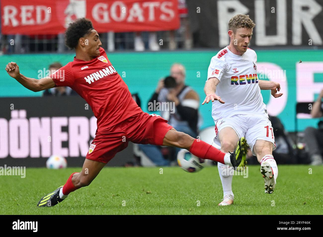 Cologne, Germany. 30th Sep, 2023. Enzo Millot (L) of VfB Stuttgart vies with Florian Kainz of FC ...