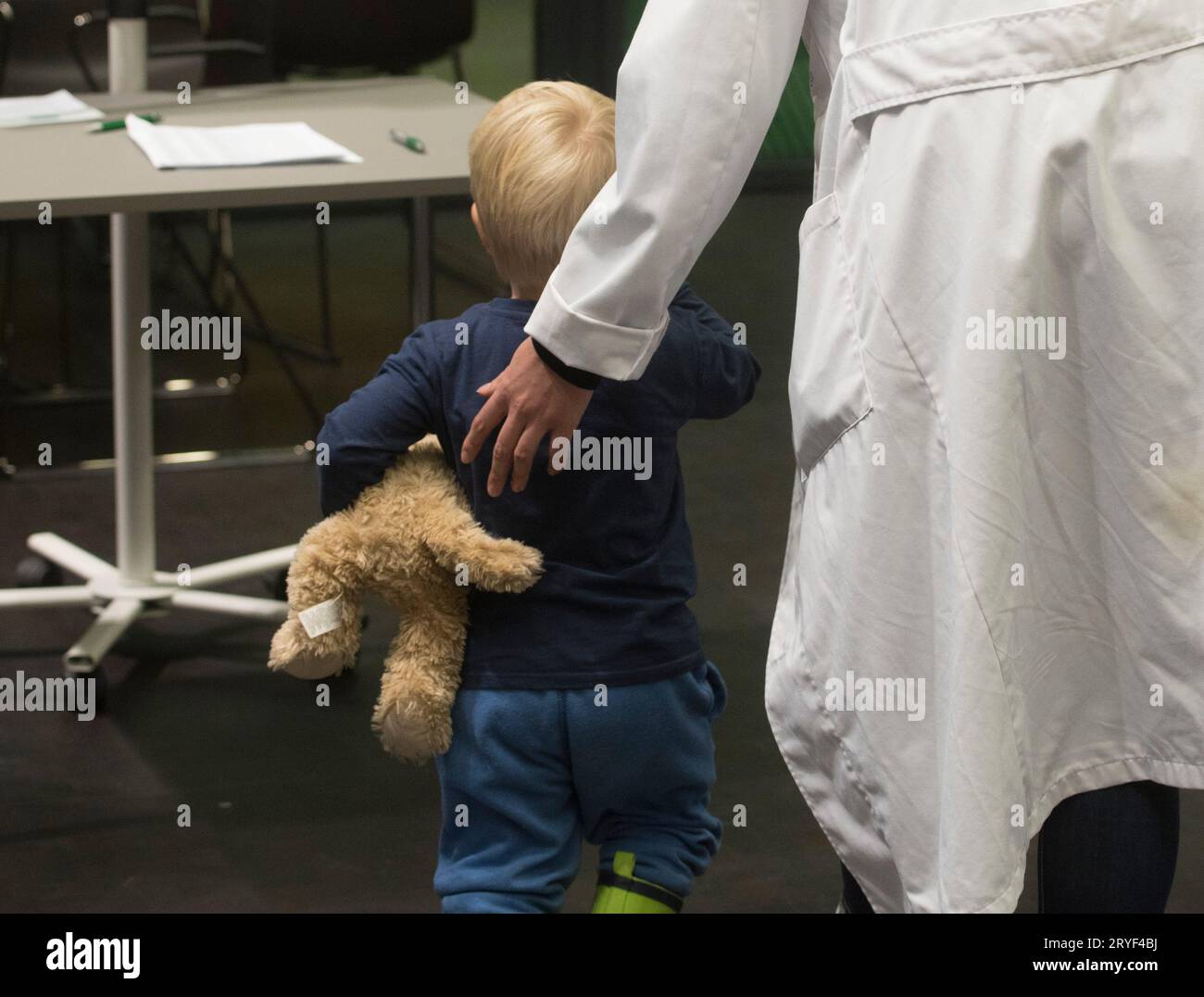 child is examined at the pediatrician, physical examination by doctor ...