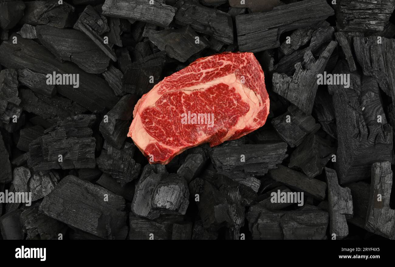 Raw beef steak cooking on hi-res stock photography and images - Alamy