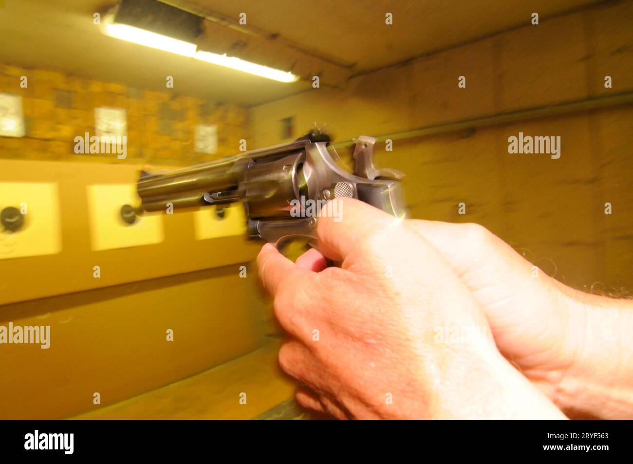Target shooter at a shooting range Stock Photo - Alamy