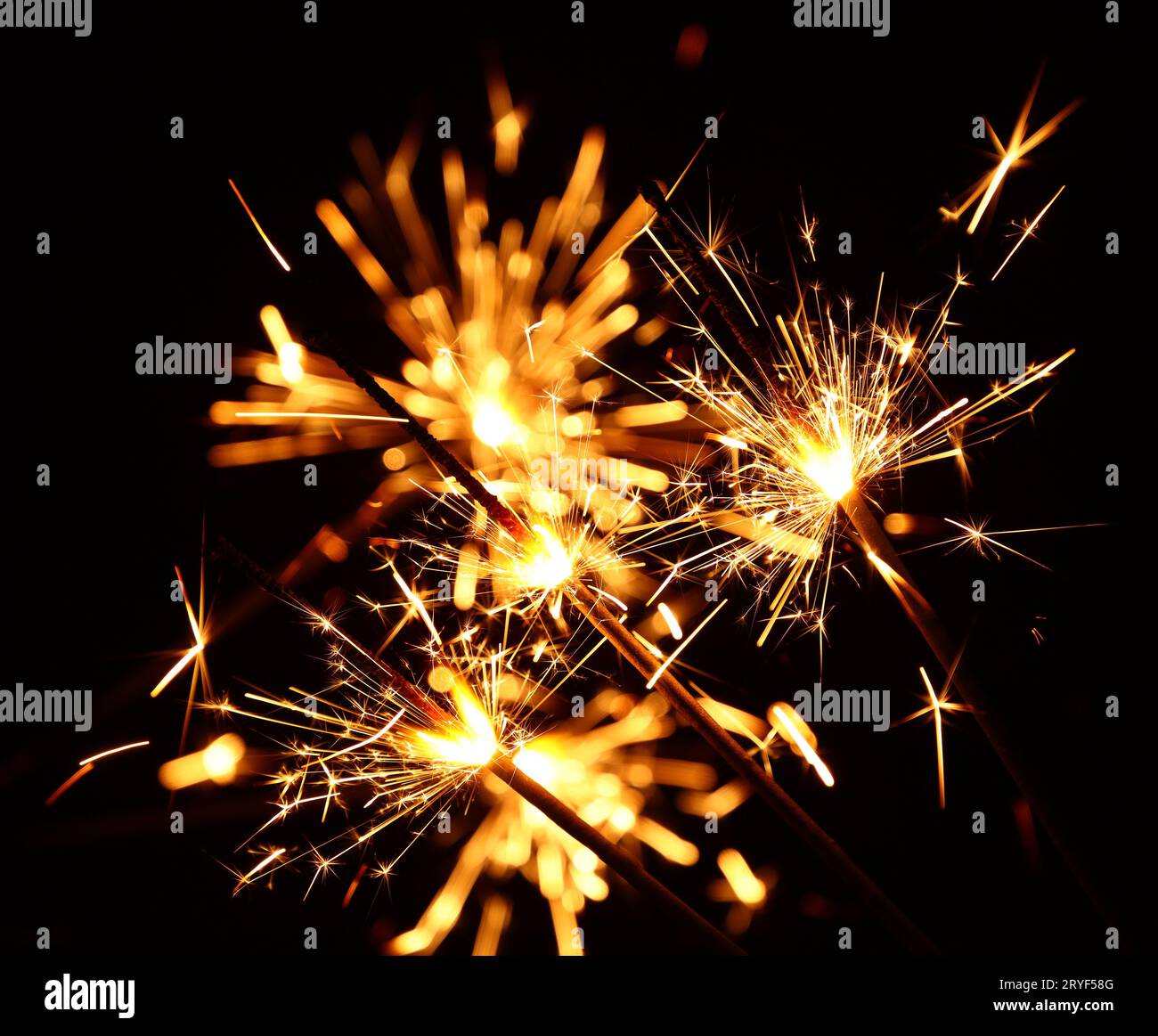 Close up several firework sparklers over black Stock Photo - Alamy