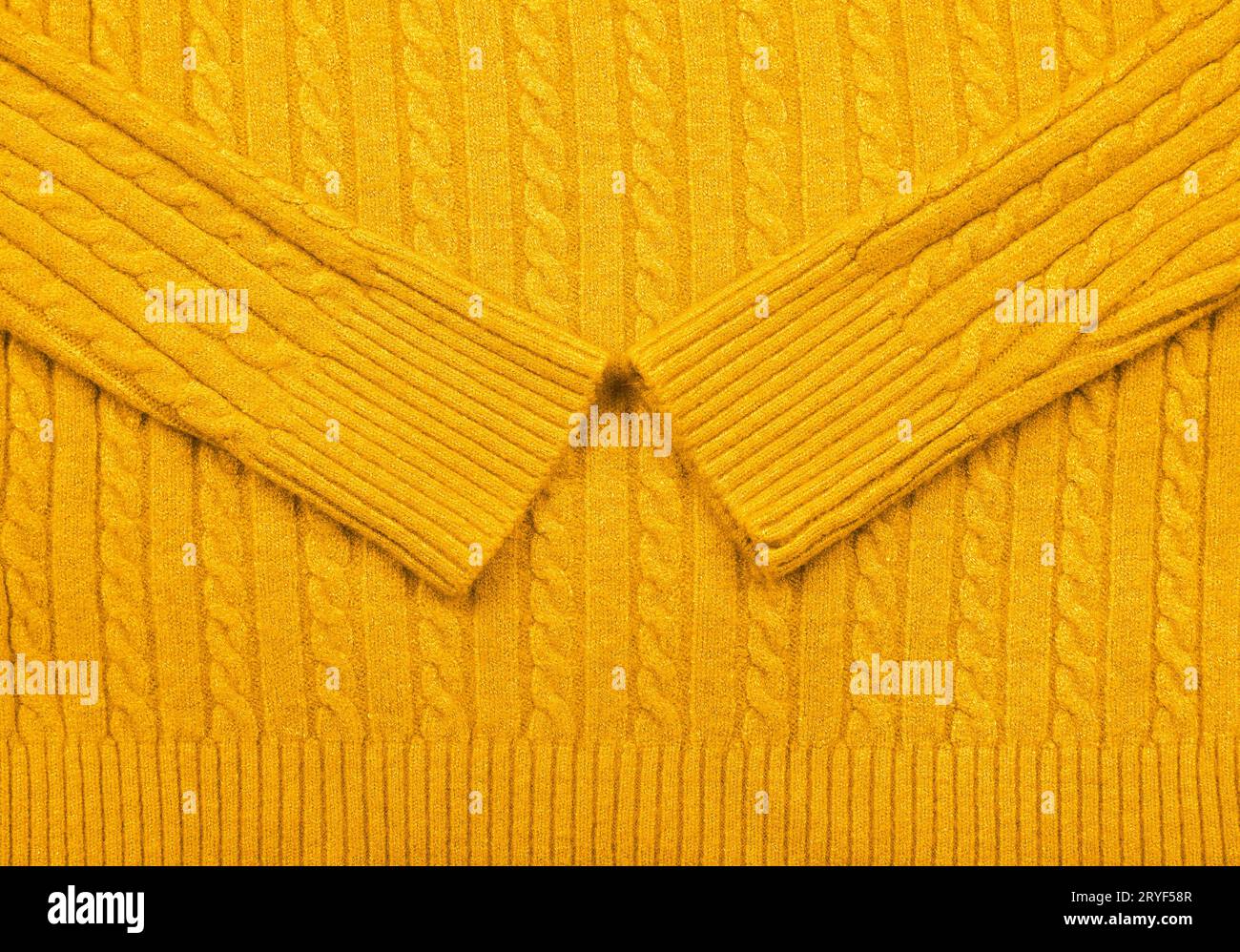 Background texture of yellow knitted wool fabric Stock Photo - Alamy