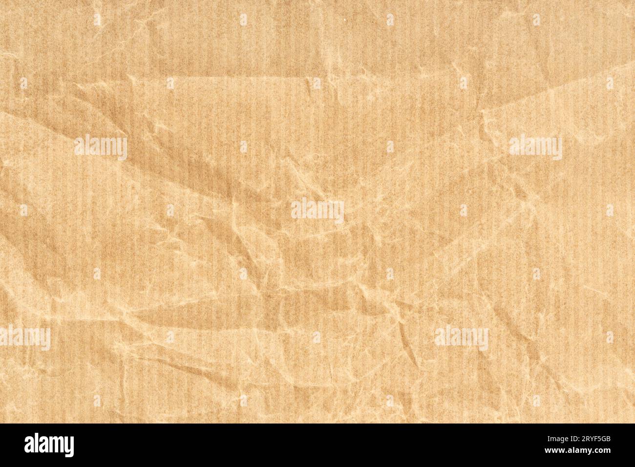 Crumpled Kraft paper texture background. Light brown color Stock Photo ...