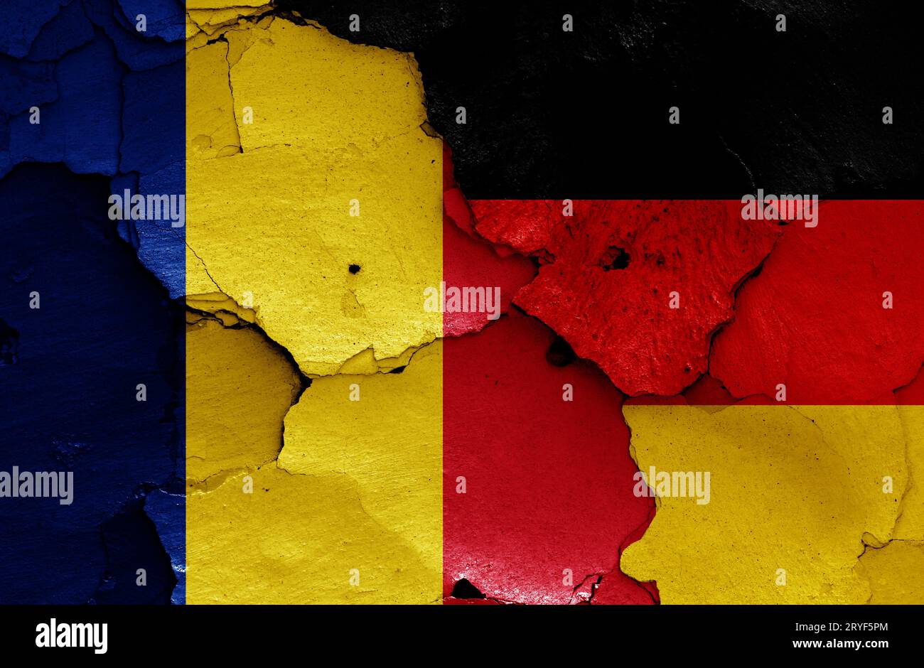Flags of Romania and Germany painted on cracked wall Stock Photo - Alamy