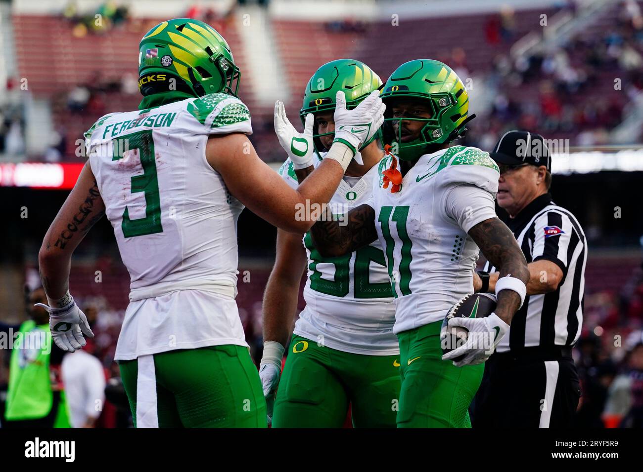 Oregon wide receiver Troy Franklin, right, celebrates with tight end ...