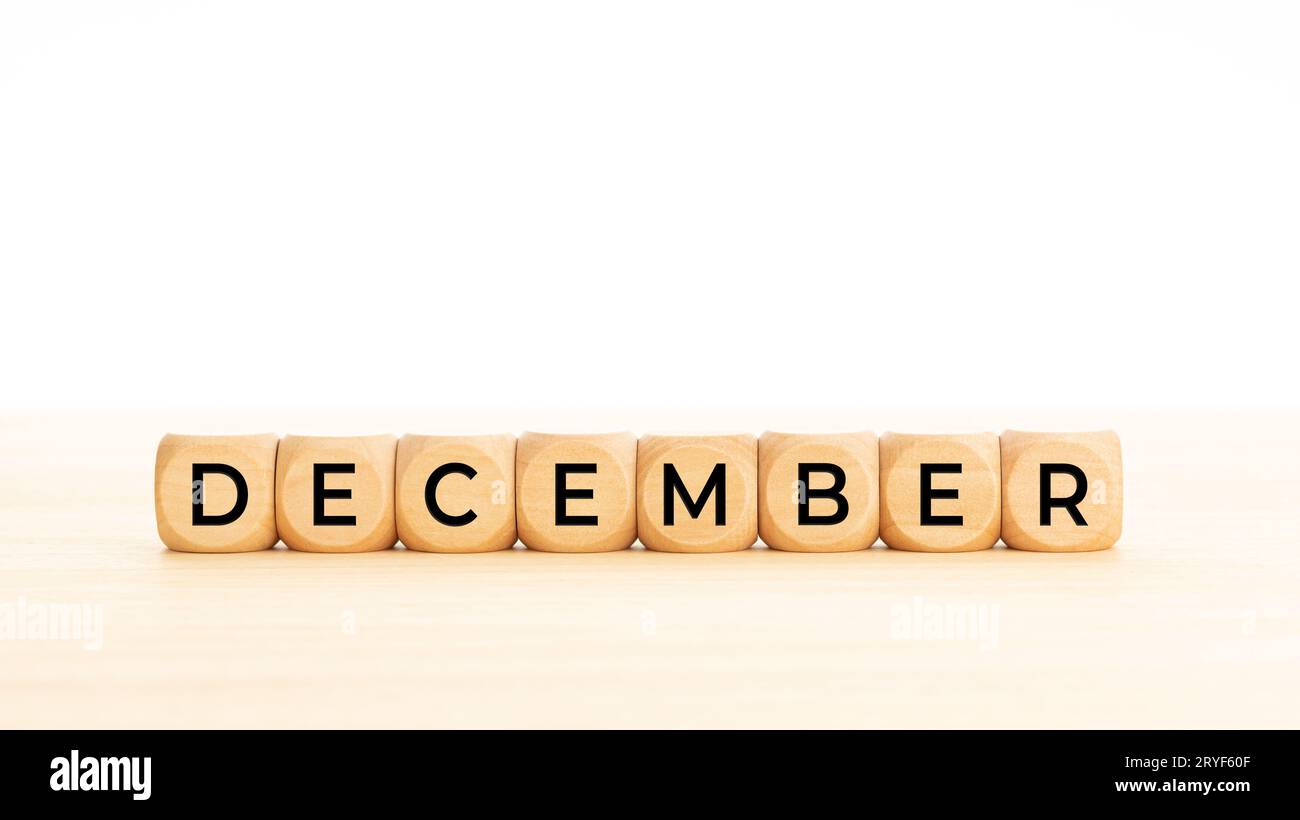 December word on wooden blocks. Copy space. White background Stock ...